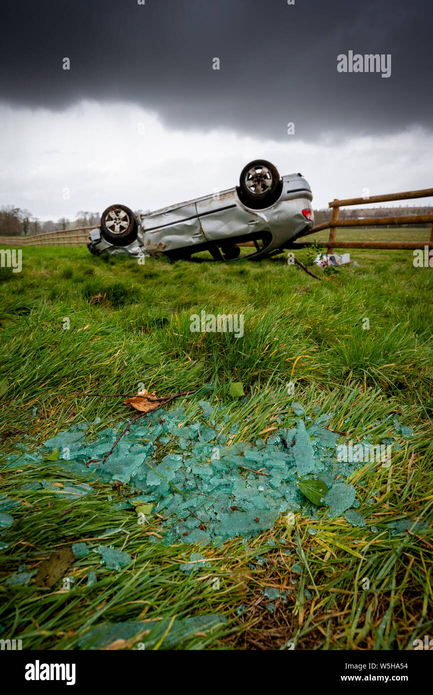 Car crash. Young drivers overturned vehicle. Non fatal accident caused ...