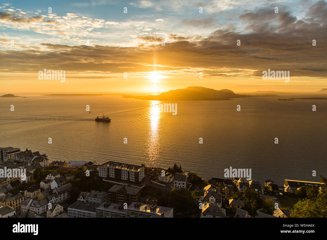 Aerial view of Alesund, Norway at sunrise. Colorful sky over famous ...