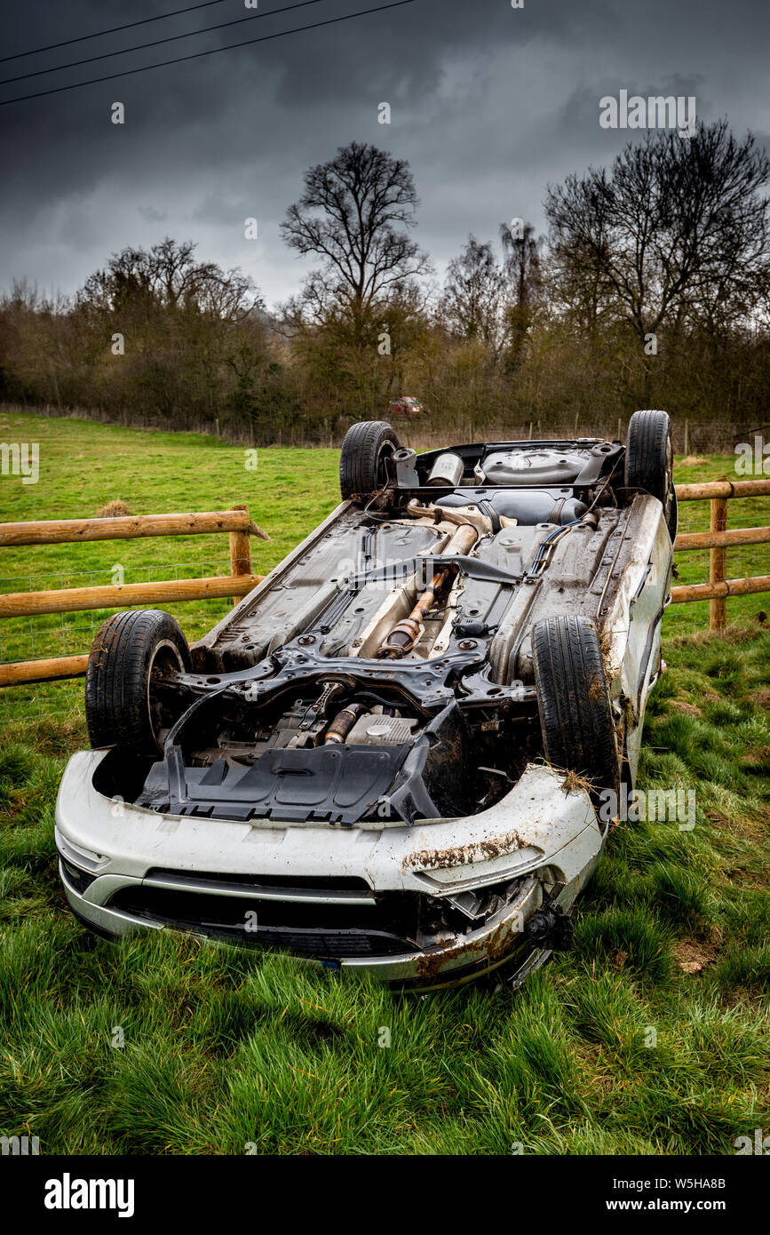 Car crash. Young drivers overturned vehicle. Non fatal accident caused ...