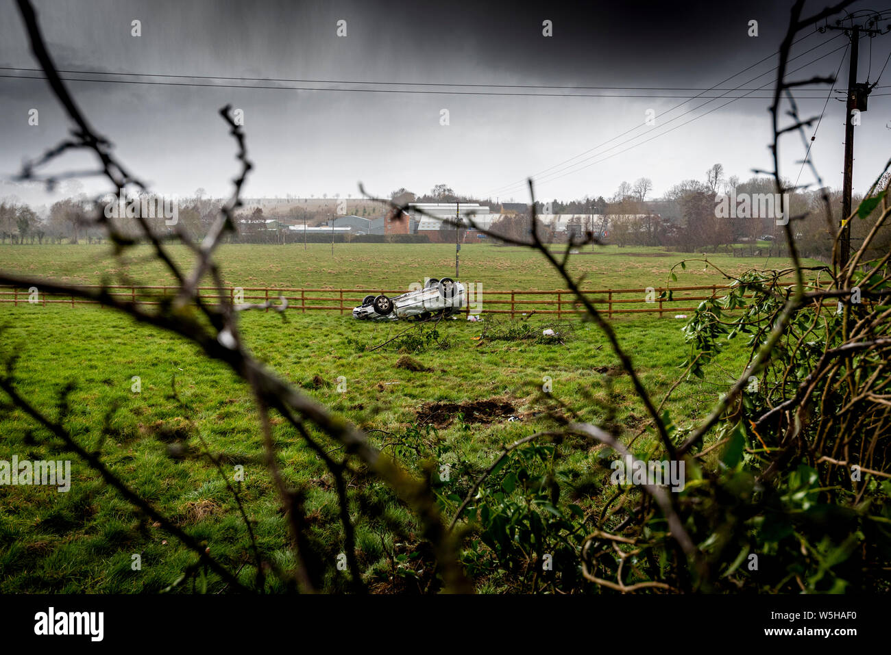 Car crash. Young drivers overturned vehicle. Non fatal accident caused ...