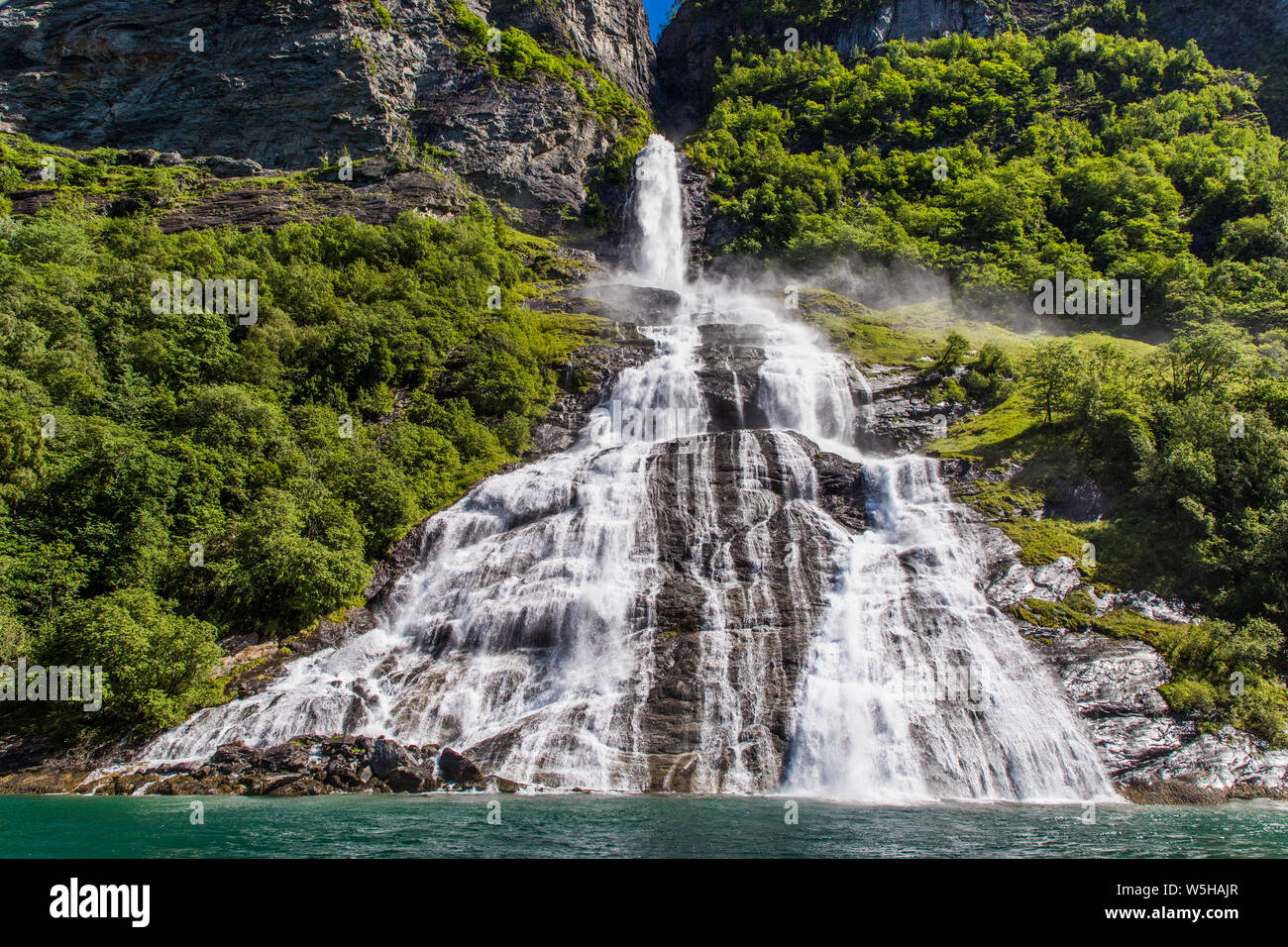 Geiranger fjord, Norway: landscape with mountains and waterfalls at ...