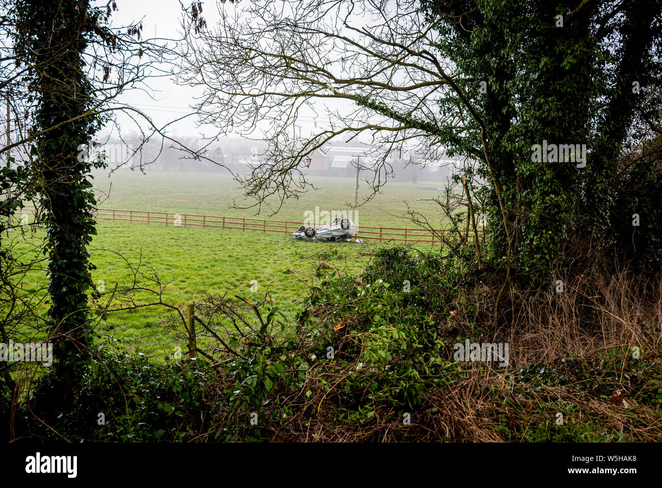 Car crash. Young drivers overturned vehicle. Non fatal accident caused ...