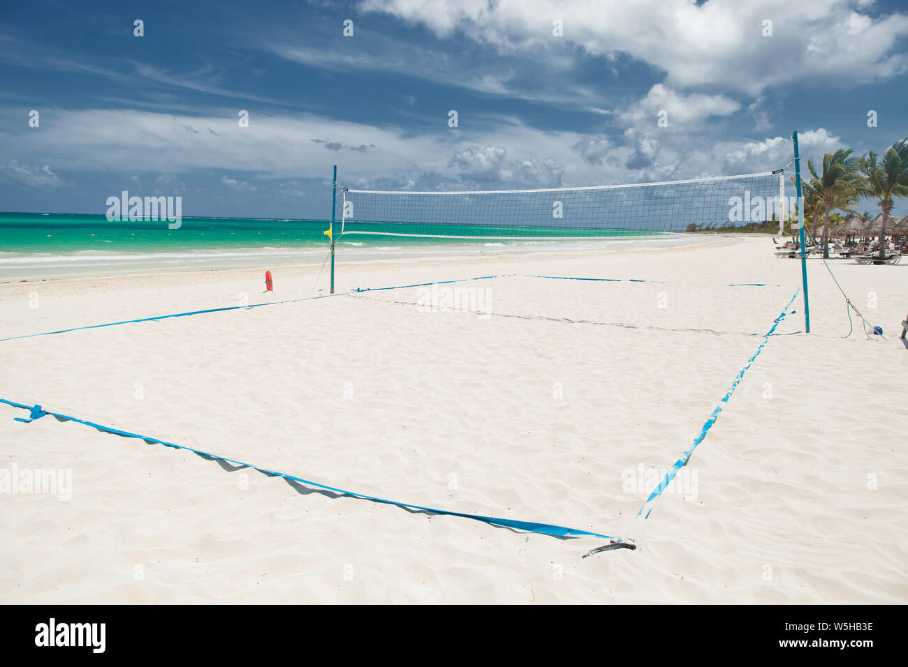 volley field on the white beaches of cancun, mexico, on a sunny day ...