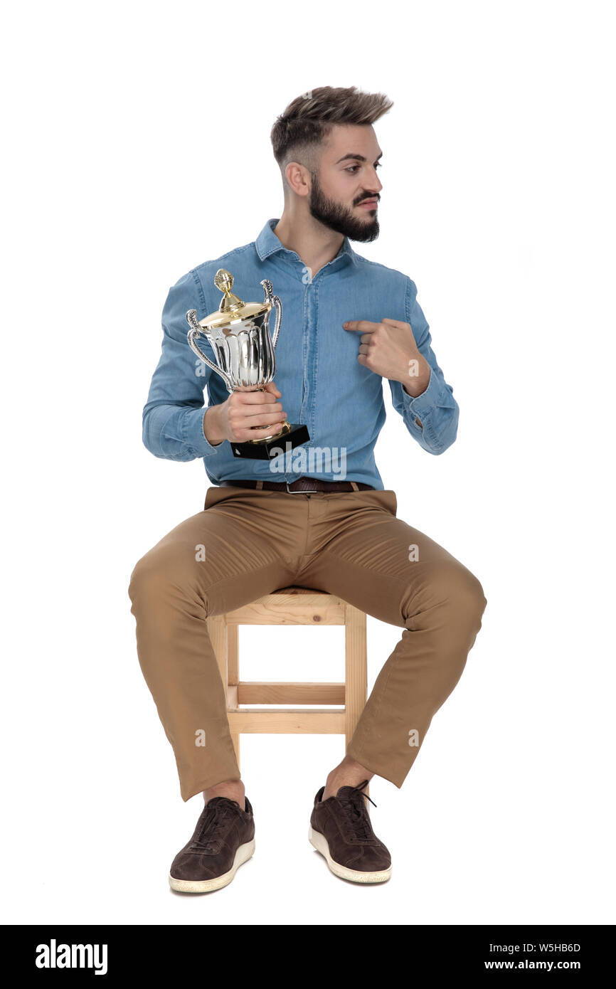 Young man beard pointing himself Cut Out Stock Images & Pictures - Alamy