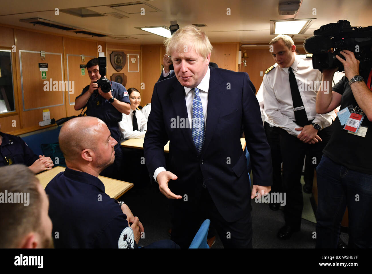 Prime Minister Boris Johnson meets crew members as he visits HMS ...