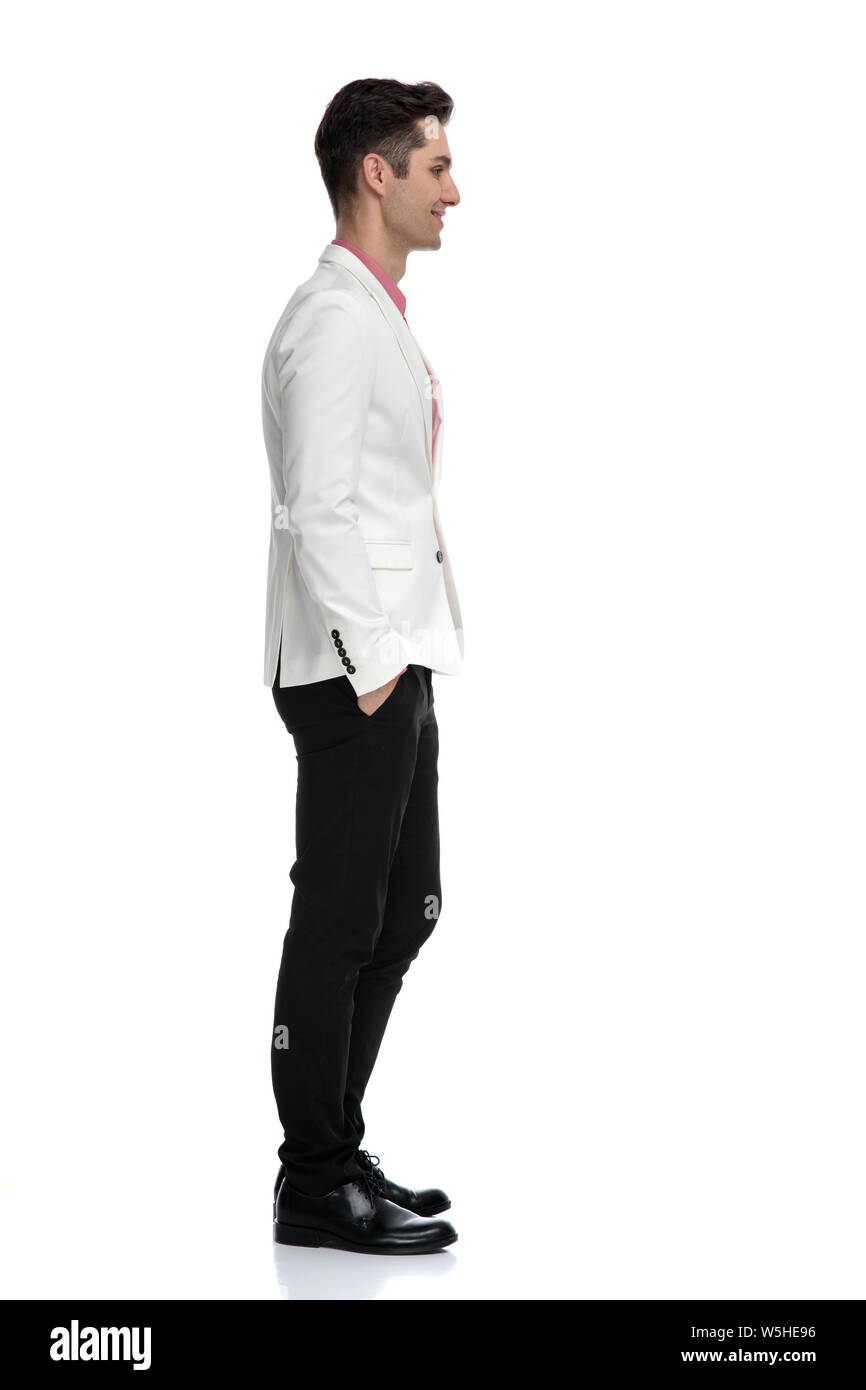 side view of an elegant man waiting in line on white background Stock ...