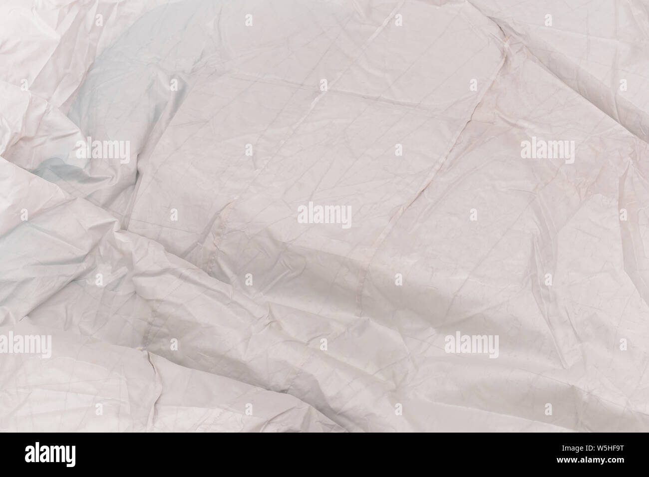 Wrinkled gray canvas that is in the water. Fabric crease background and ...