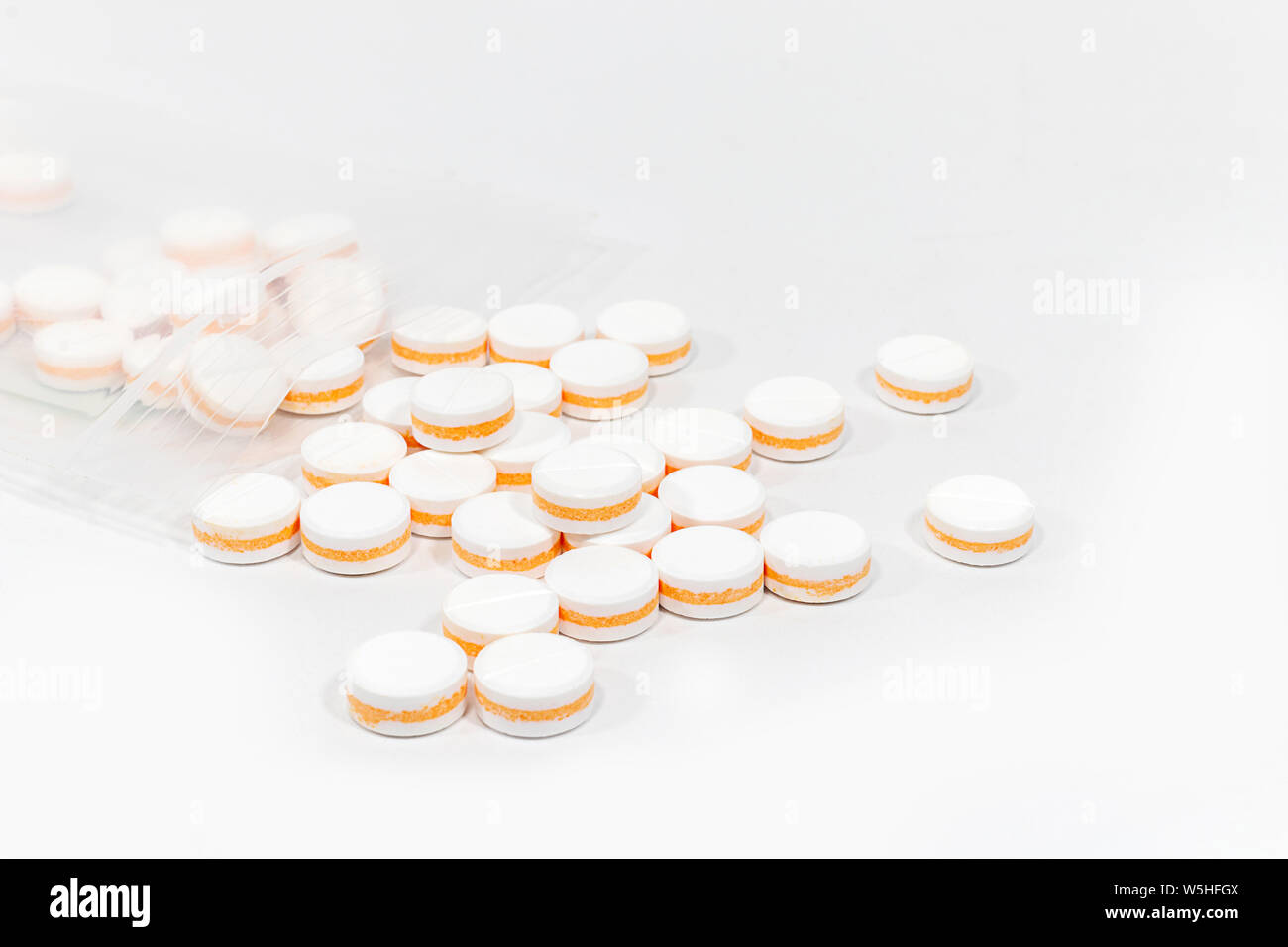 White pills, painkillers on a white background. Concept healthcare and ...