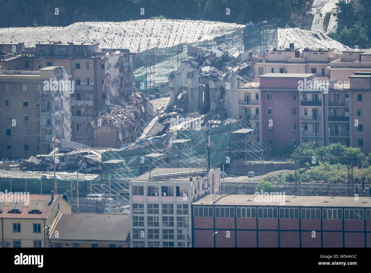 Controlled demolition of the Ponte Morandi in Genoa, Italy, which - on ...