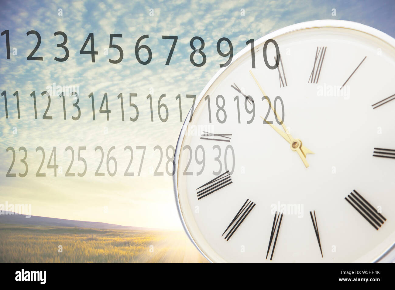 sheet of a calendar with the number of days, clock and nature Stock ...