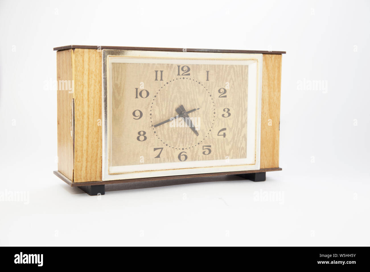 old wooden clock on white background Stock Photo - Alamy