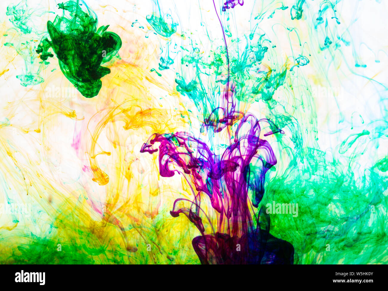 Acrylic colors and ink in water. Abstract background Stock Photo - Alamy