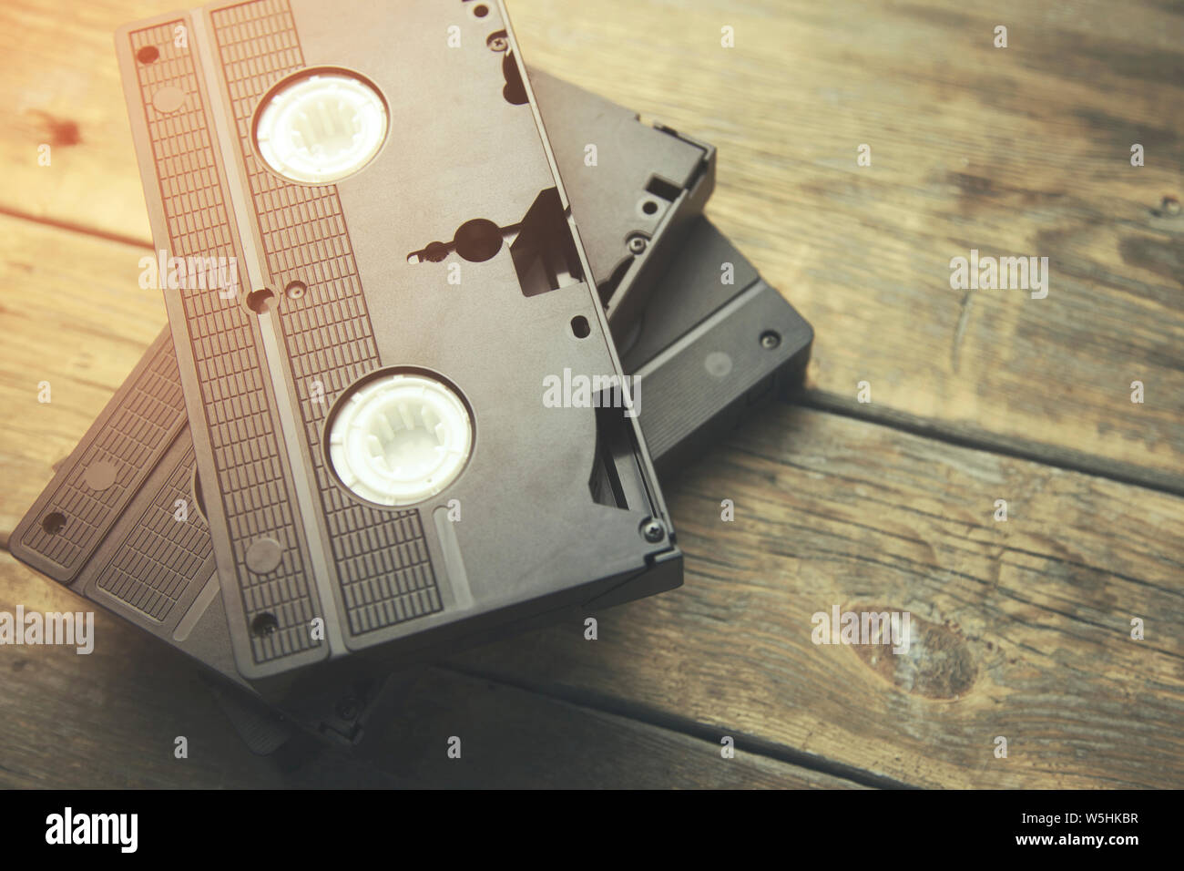 old retro video tape over wooden background Stock Photo - Alamy