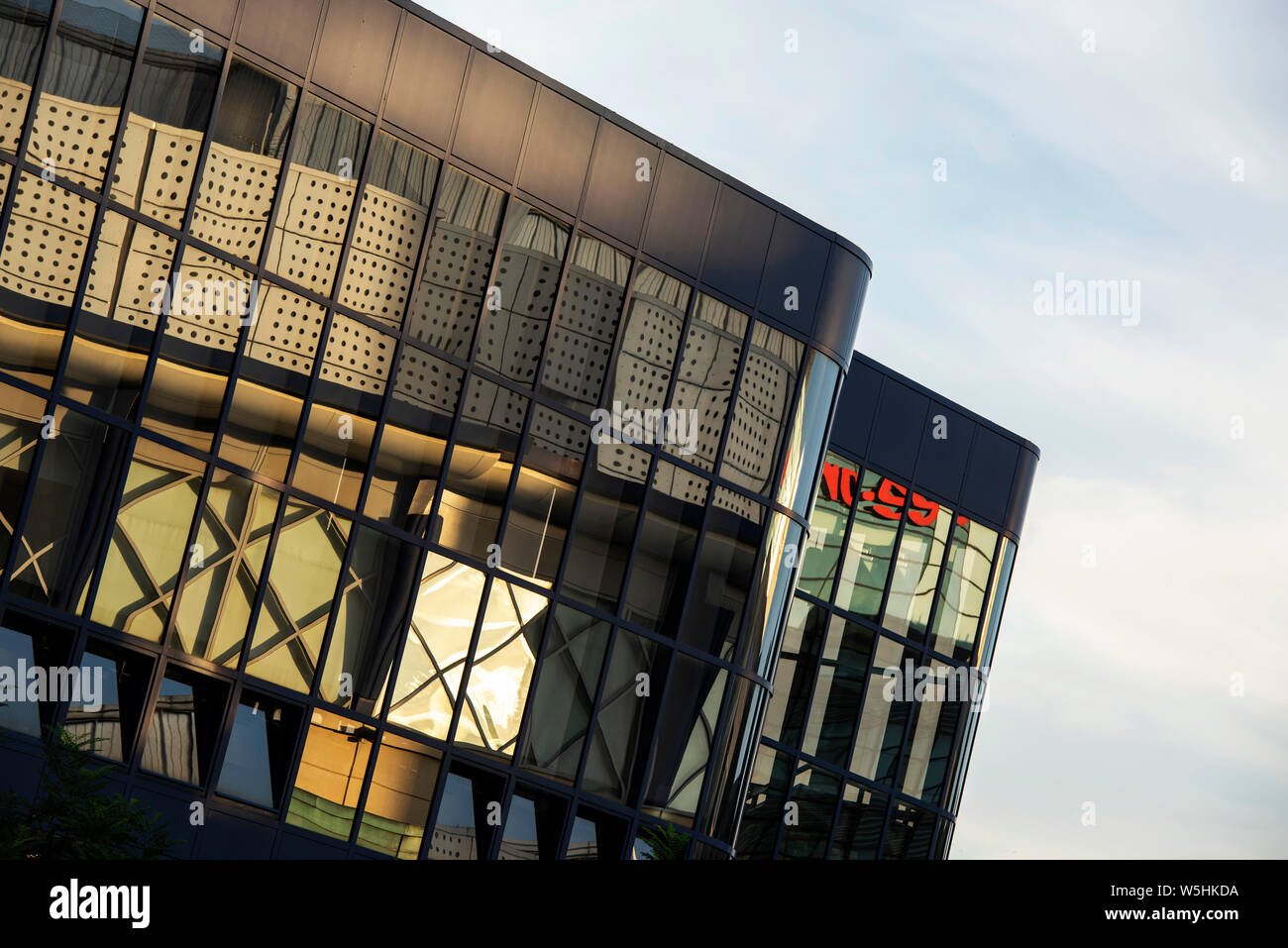 Dusk reflections in the windows of the Concert Hall in Nottingham City ...