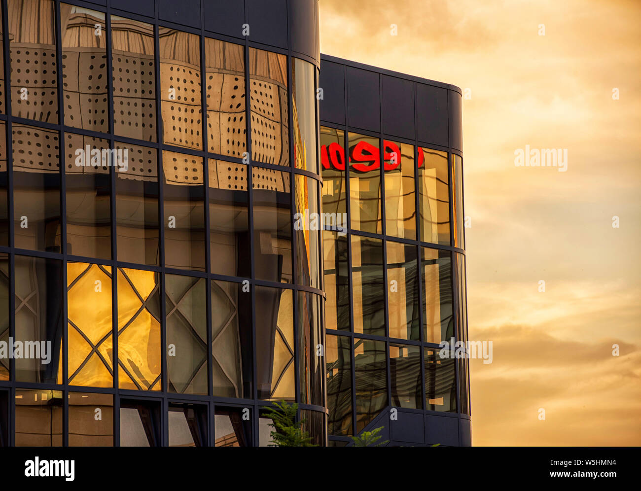 Dusk reflections in the windows of the Concert Hall in Nottingham City ...