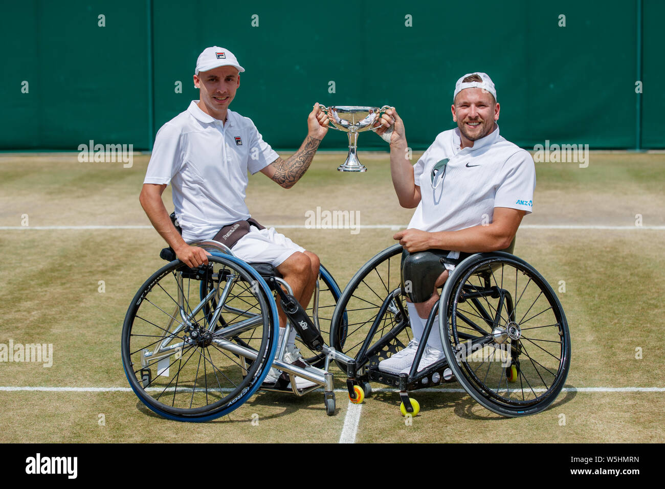 Dylan Alcott and Andy Lapthorne celebrate winning the Quad doubles ...