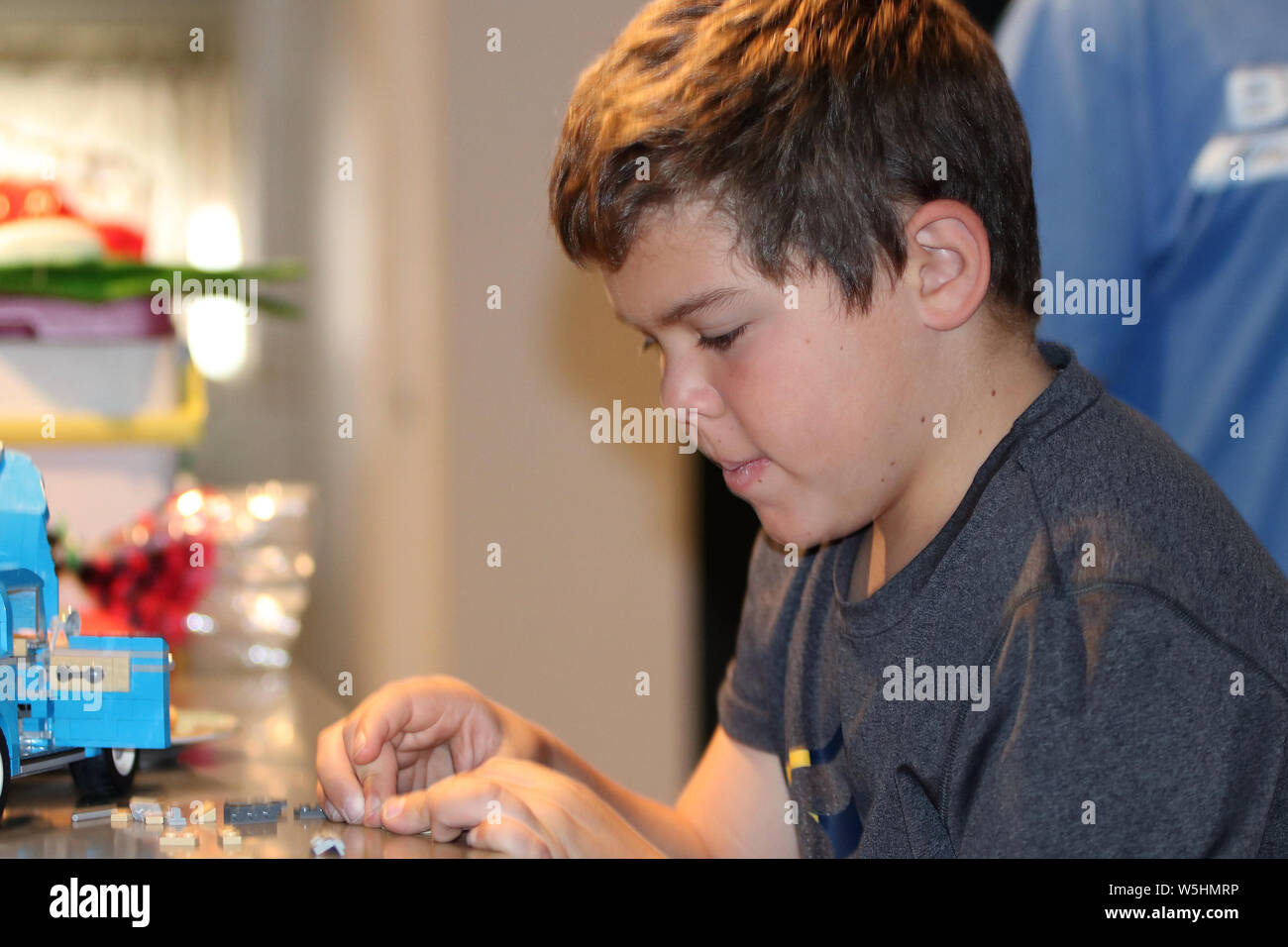 Boy Building Model From Blocks Stock Photo - Alamy