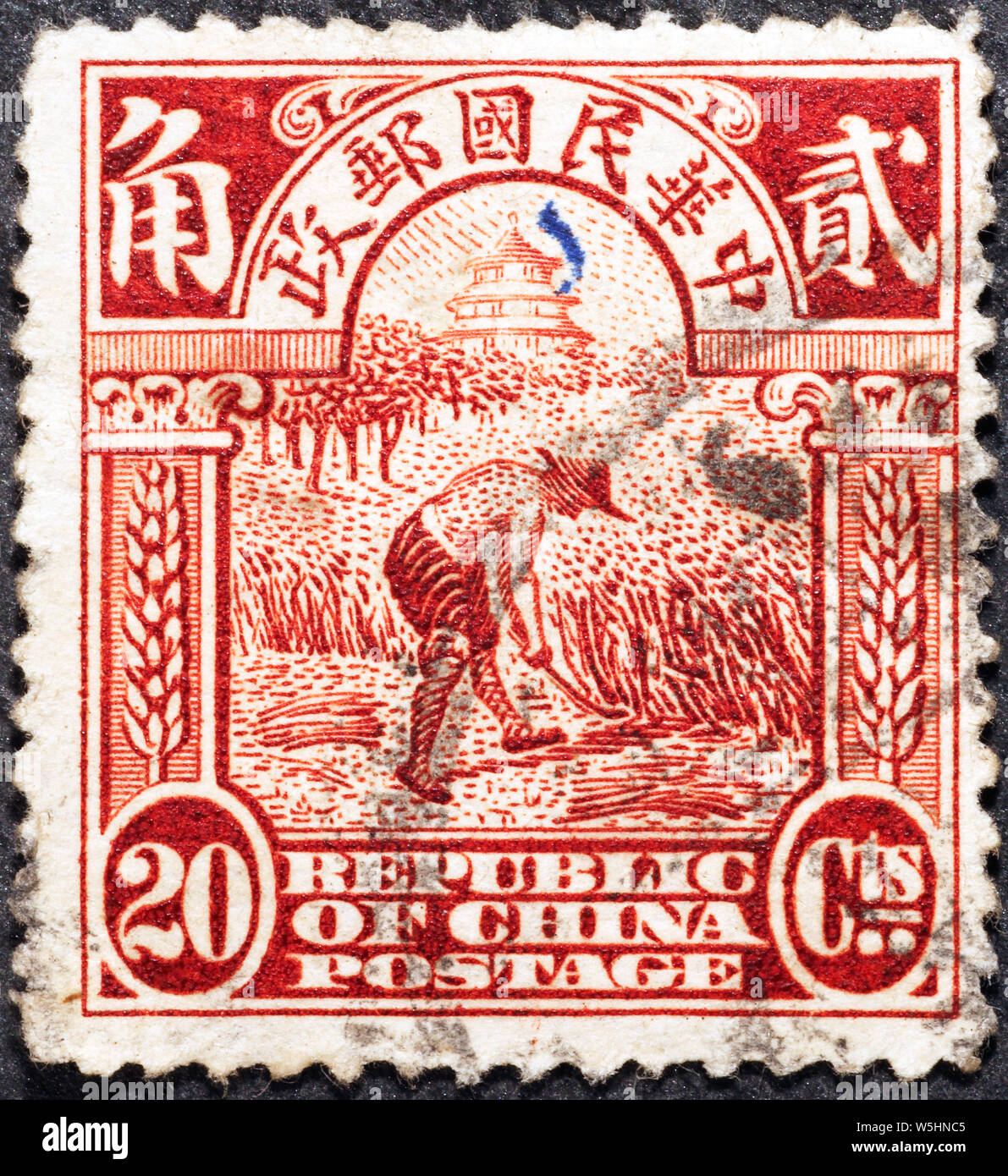Chinese farmer on ancient postage stamp Stock Photo - Alamy