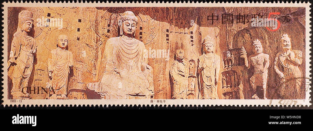 Giant statues of Buddha on chinese postage stamp Stock Photo - Alamy