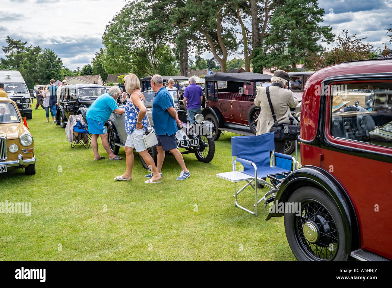Members of the general public admiring the veteran cars on display at ...