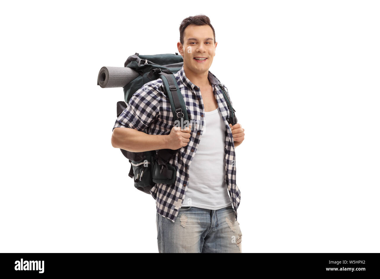 Male tourist with a backpack smiling at the camera isolated on white ...