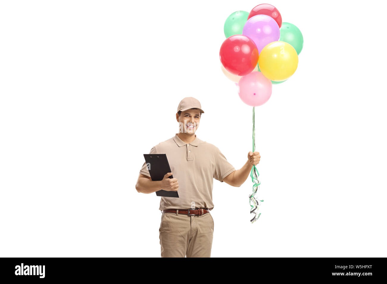 Delivery man carrying a bunch of balloons isolated on white background ...