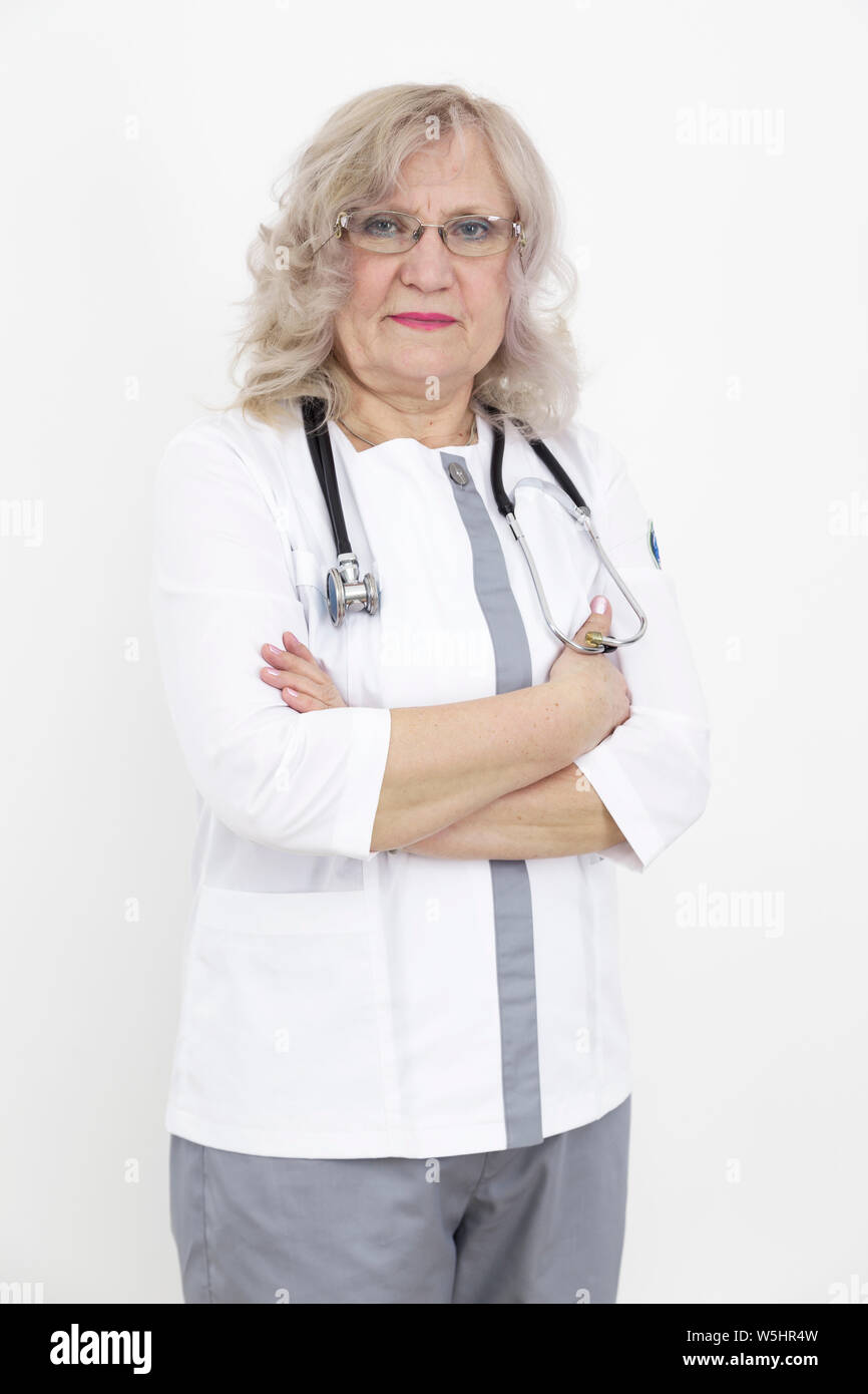 elderly female doctor in modern medical uniform with a stethoscope ...