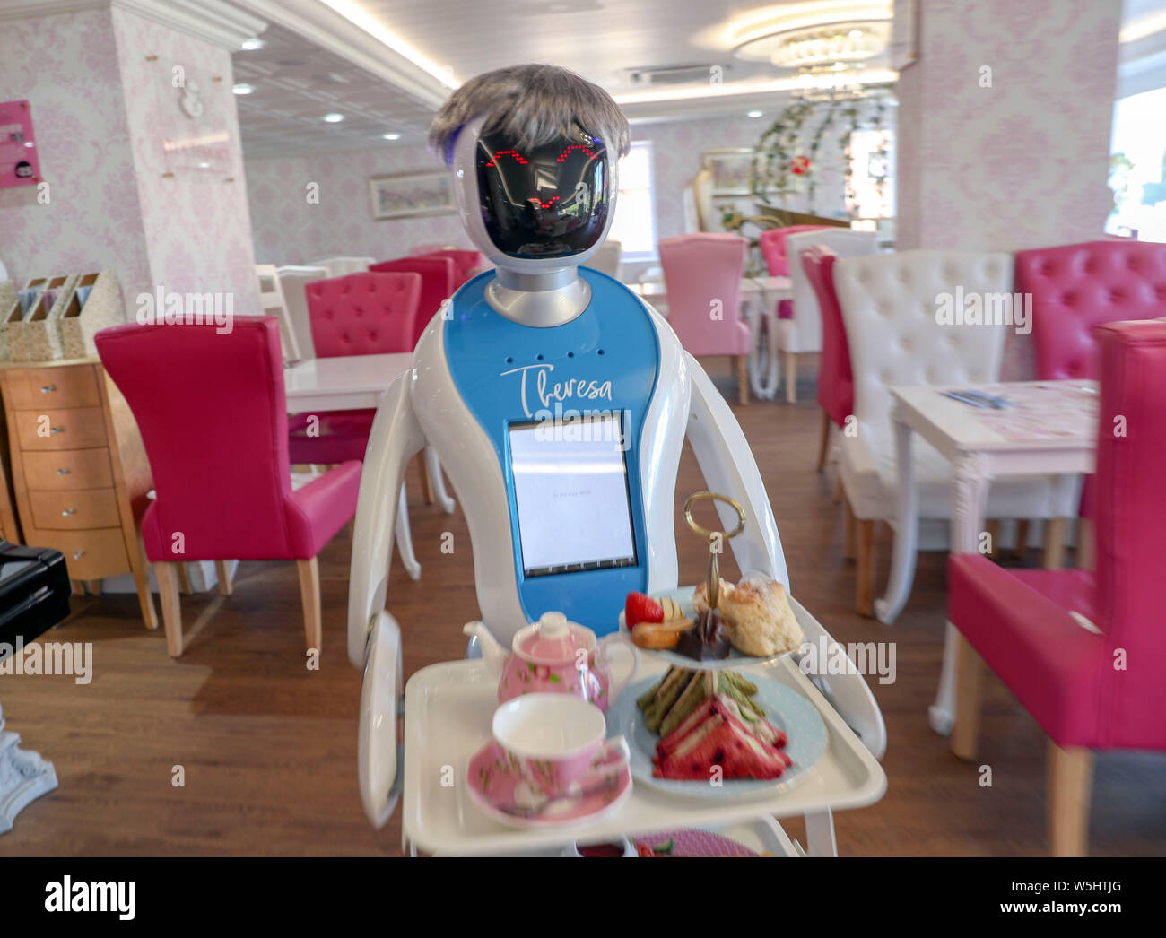 Theresa the robotic waitress at The Tea Terrace's Cobham branch in ...