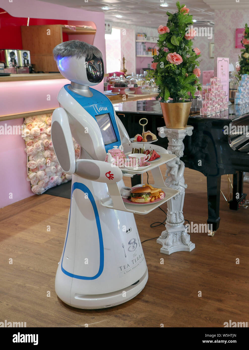 Theresa the robotic waitress at The Tea Terrace's Cobham branch in ...