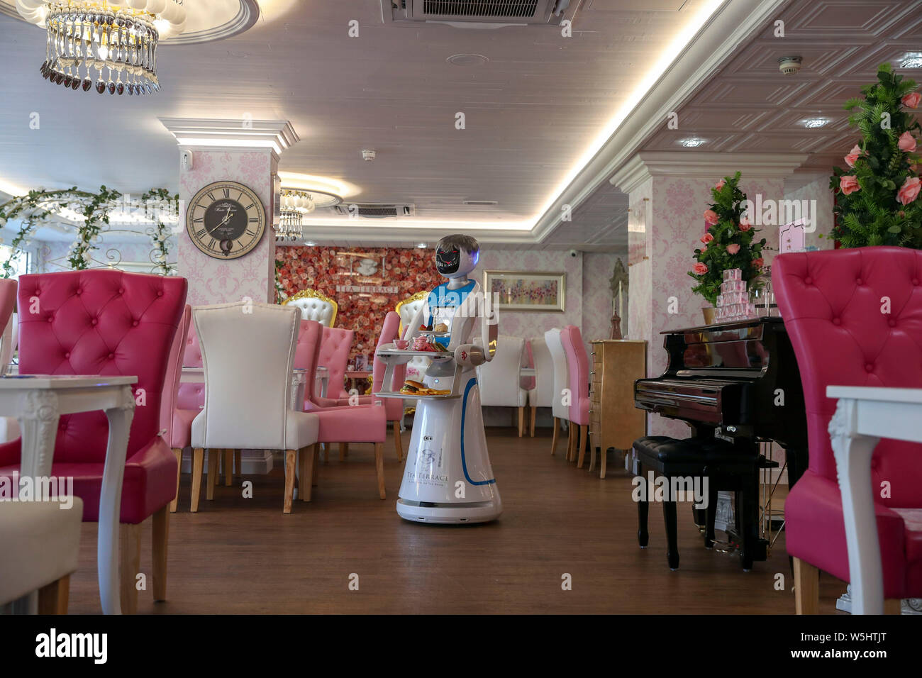 Theresa the robotic waitress at The Tea Terrace's Cobham branch in ...