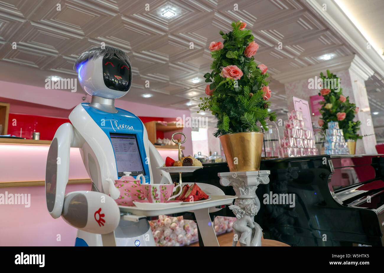 Theresa the robotic waitress at The Tea Terrace's Cobham branch in ...