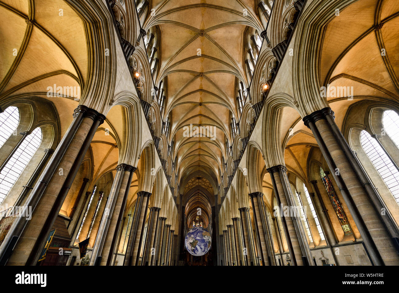 Vaulted ceiling of nave with pillars and upper clerestory of medieval ...