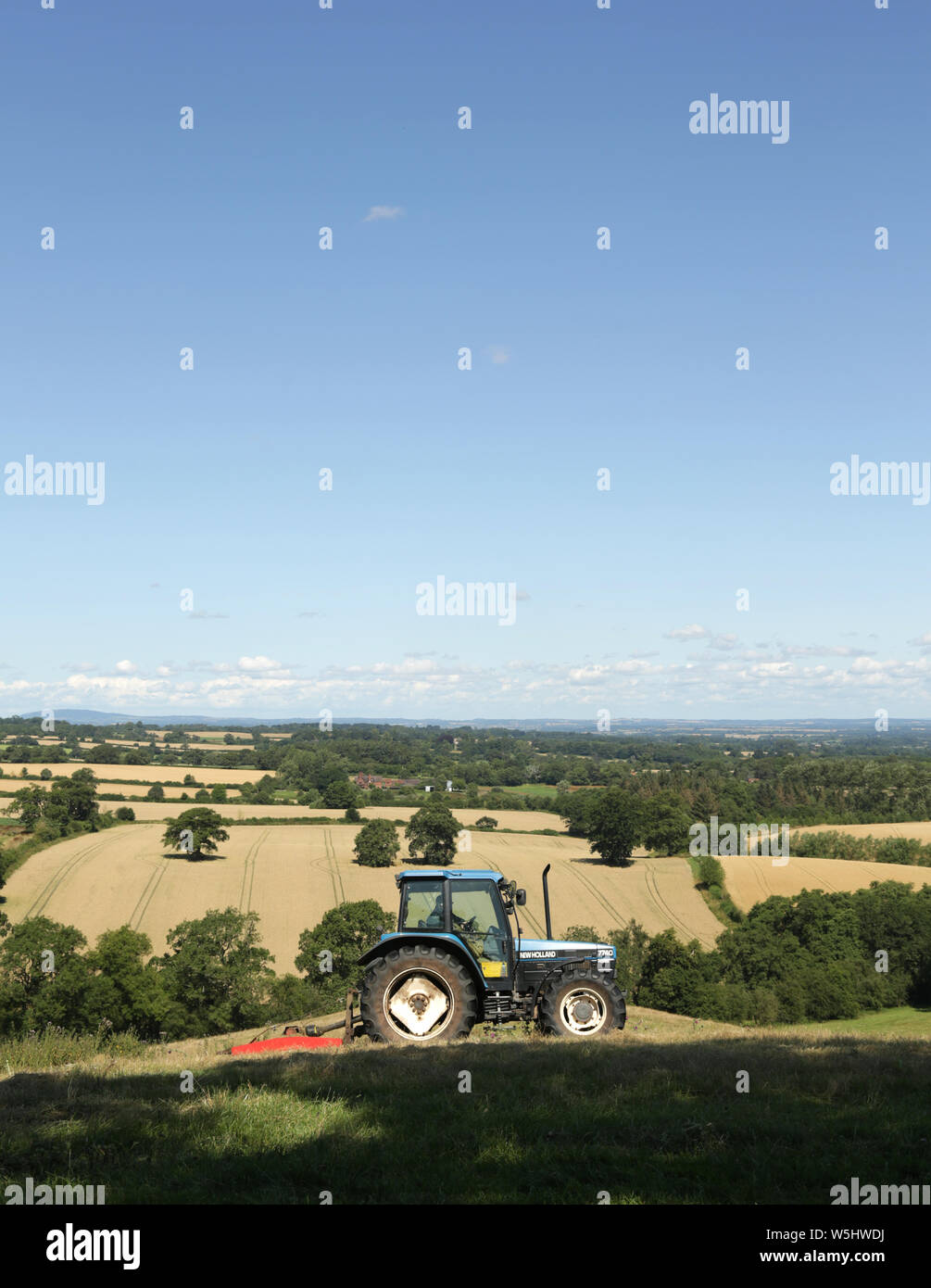 A New Holland tractor working in the English countryside Stock Photo ...