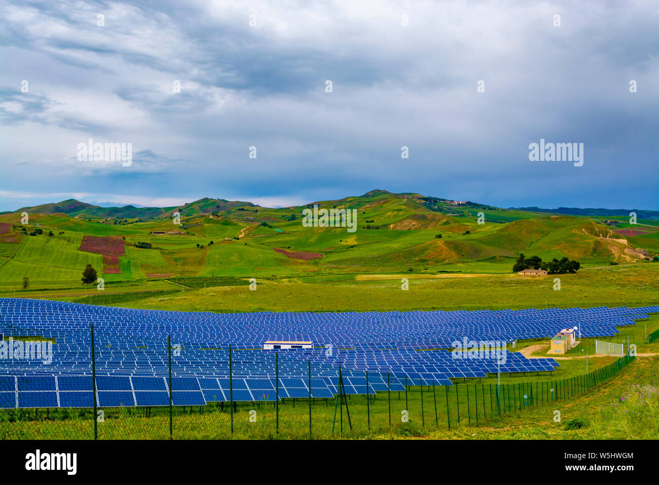Power plant solar energie, green valley with sun panels in Sicily ...