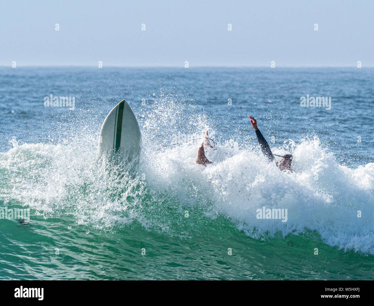 Falling off surfboard hi-res stock photography and images - Alamy