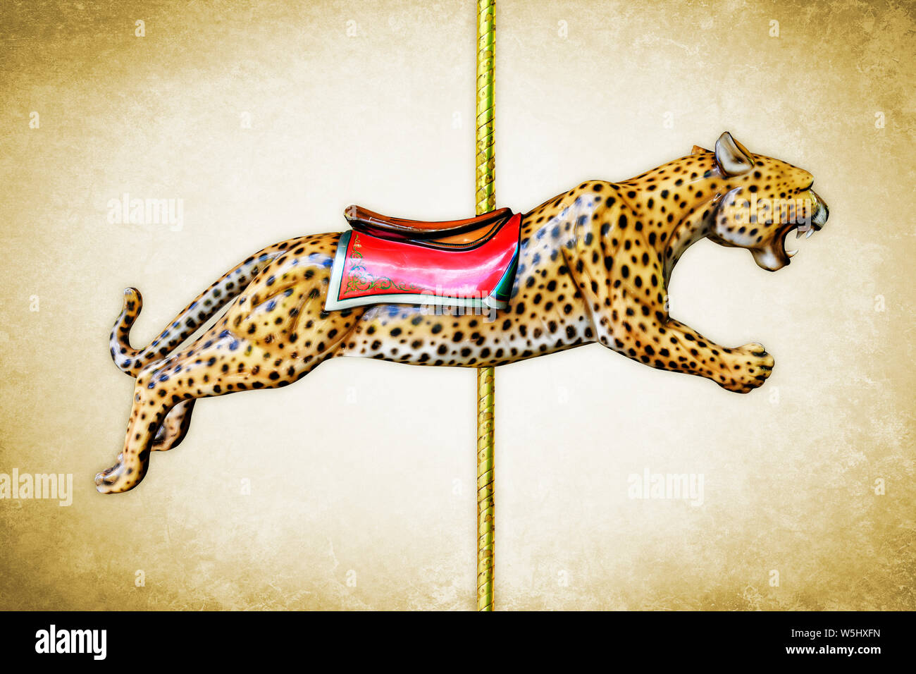 Carnival carousel leopard isolated on gold background Stock Photo - Alamy