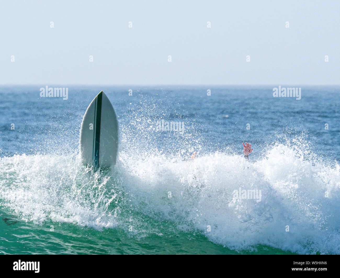 Falling off surf board hi-res stock photography and images - Alamy