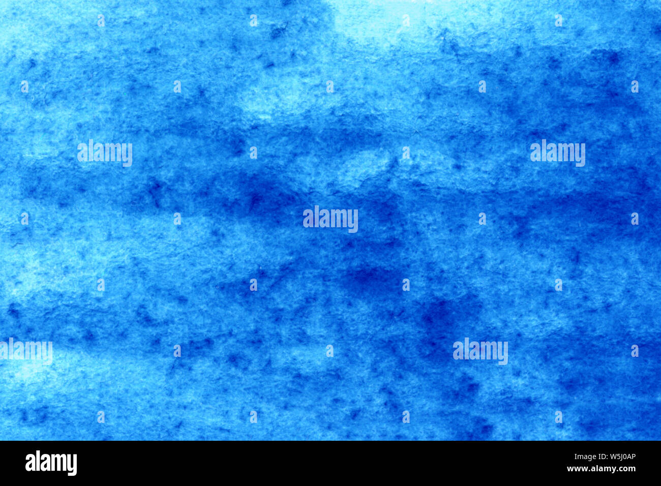 Abstract blue ink spot textured background. Modern design watercolor ...