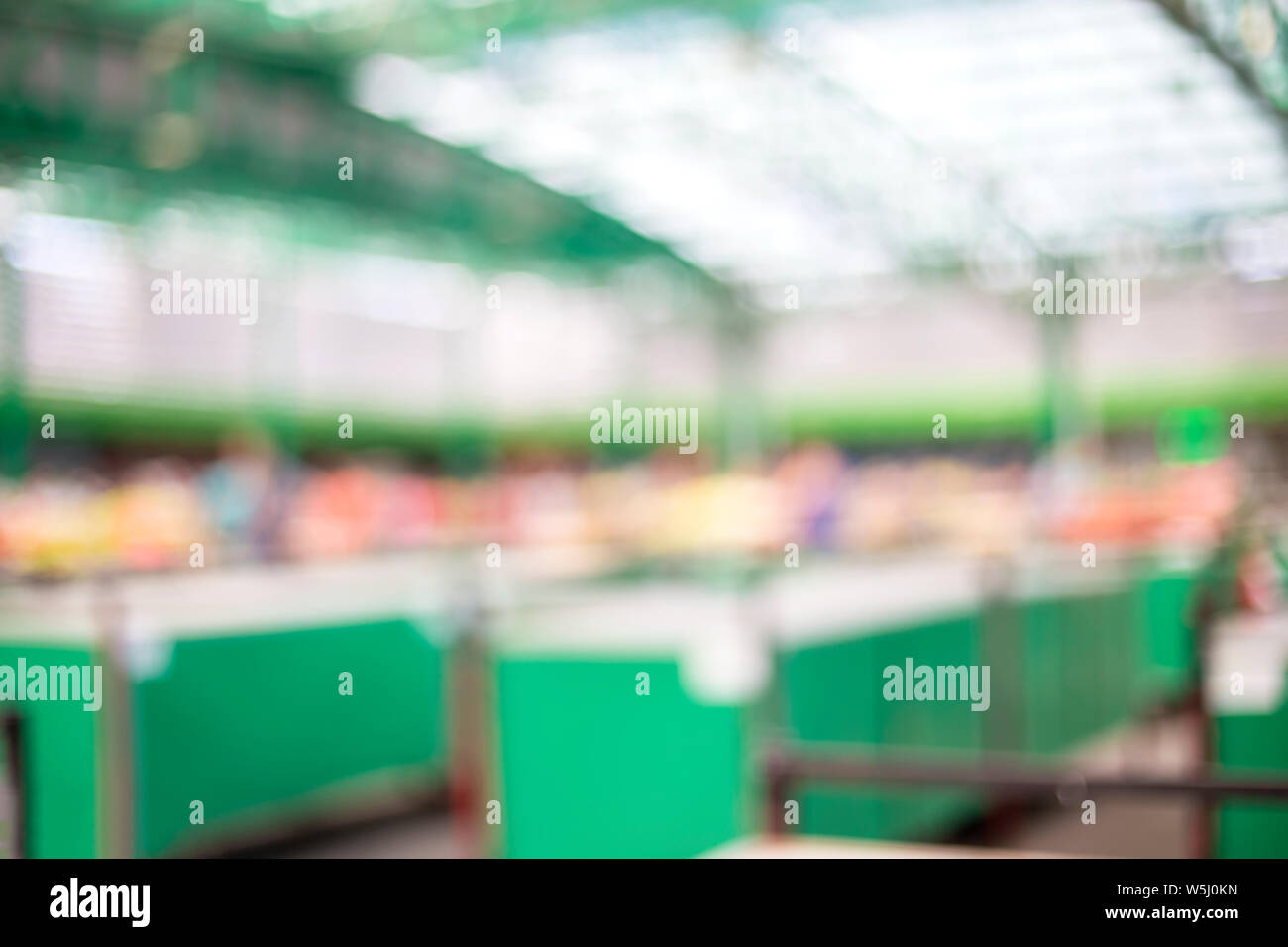 Blurred defocused backdrop of farmer market stalls Stock Photo - Alamy
