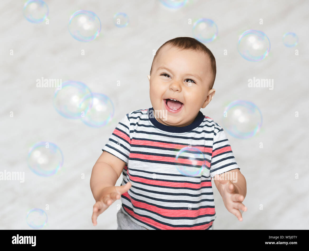 Baby Blowing Bubbles High Resolution Stock Photography and Images - Alamy