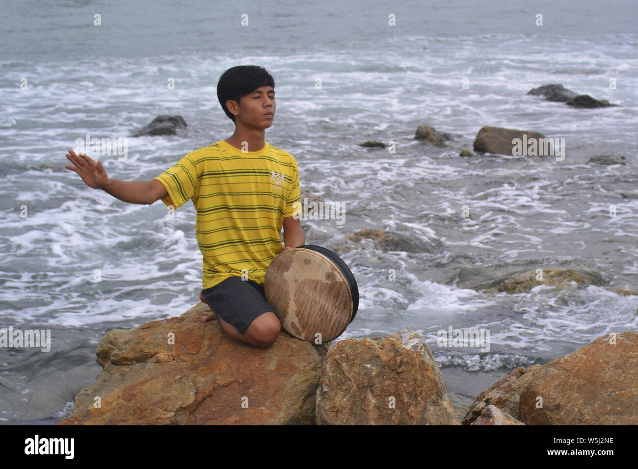 July 29, 2019, Susoh, aceh, Indonesia: A young man plays a traditional ...