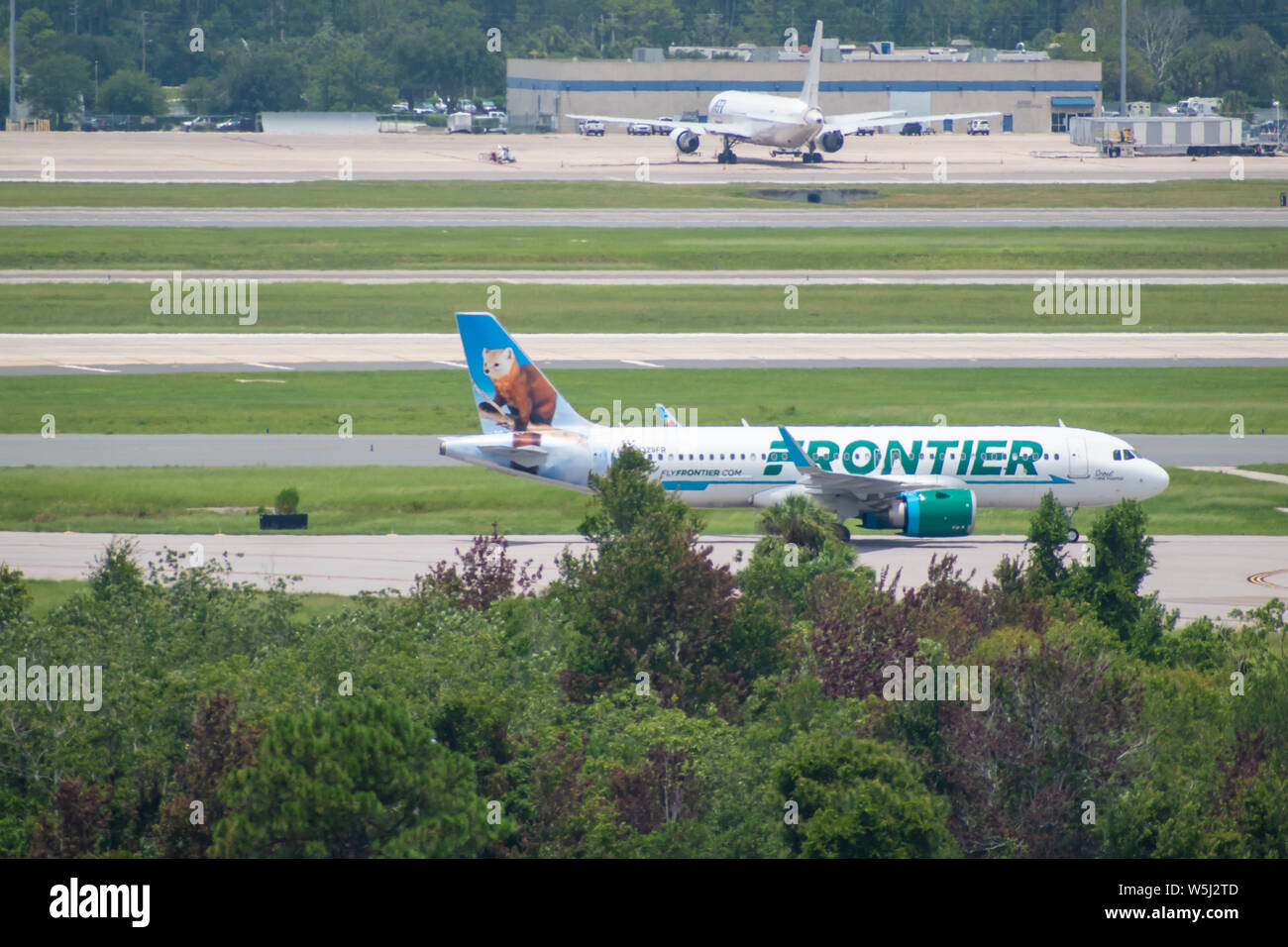 Orlando, Florida. July 09, 2019 Frontier Airlines aircraft on runway ...