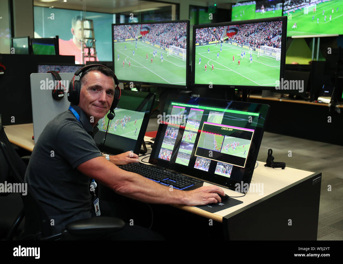Former Premier League Referee Neil Swarbrick sits at a VAR station ...