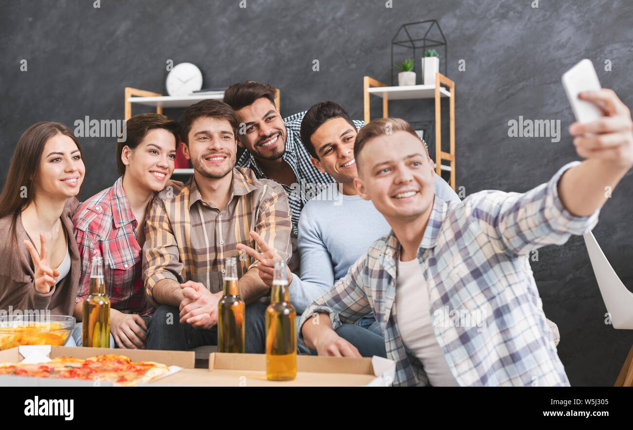 Portrait happy young friends partying hi-res stock photography and ...