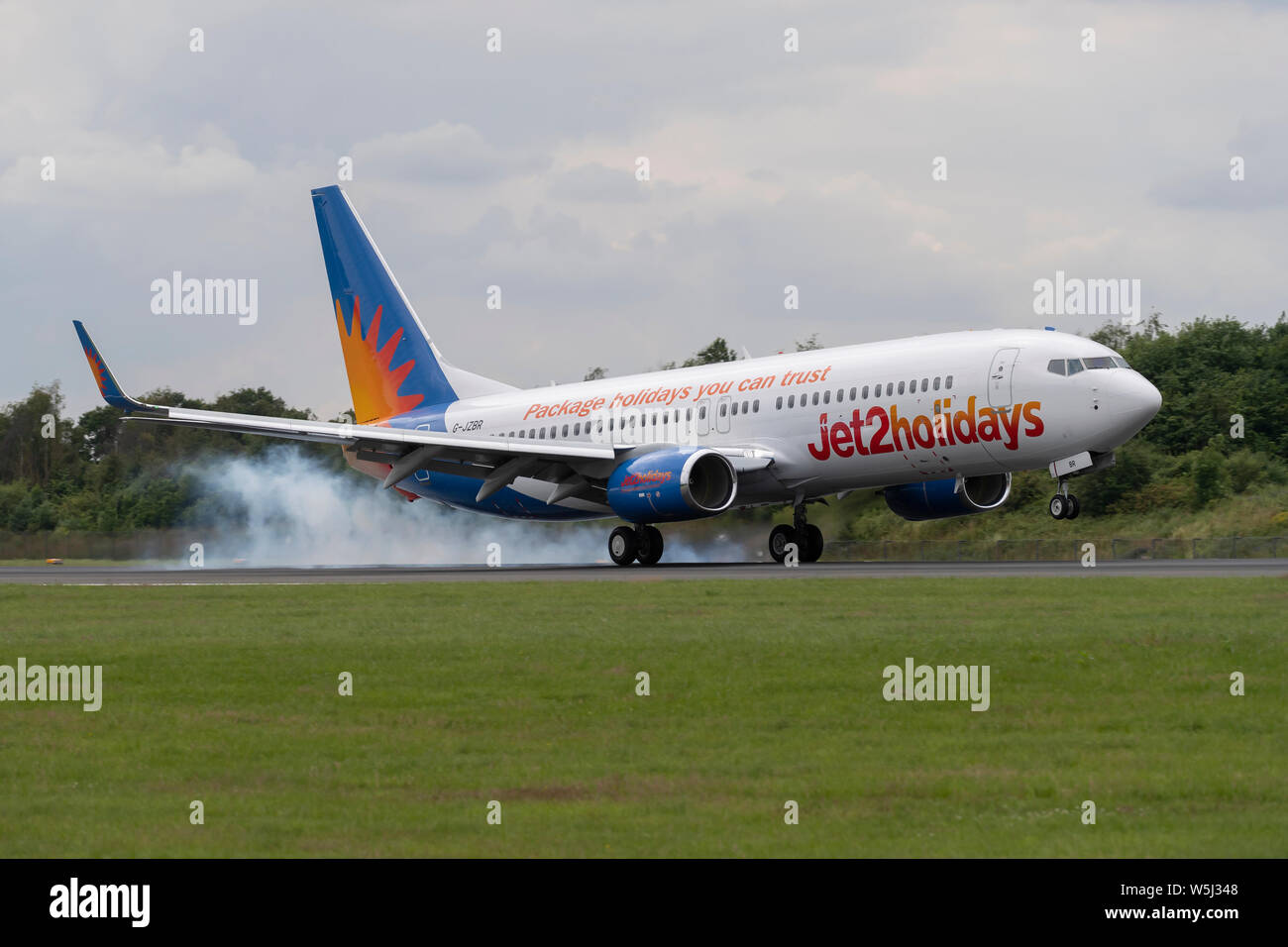 A Jet2 Boeing 737-800 lands at Manchester International Airport ...