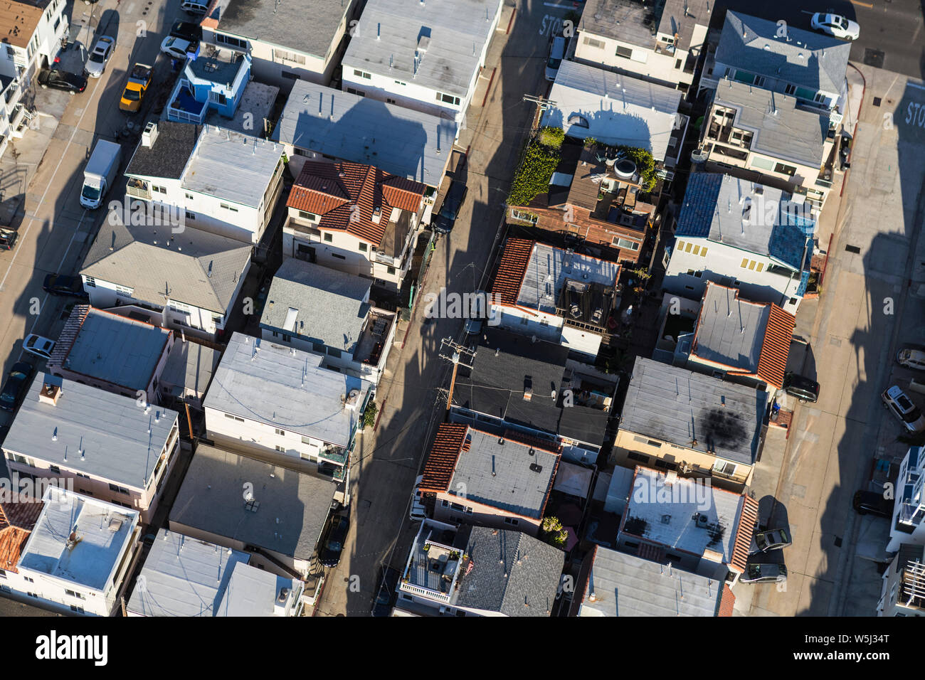 Aerial view of closely packed homes, streets and alleys in Los Angeles ...