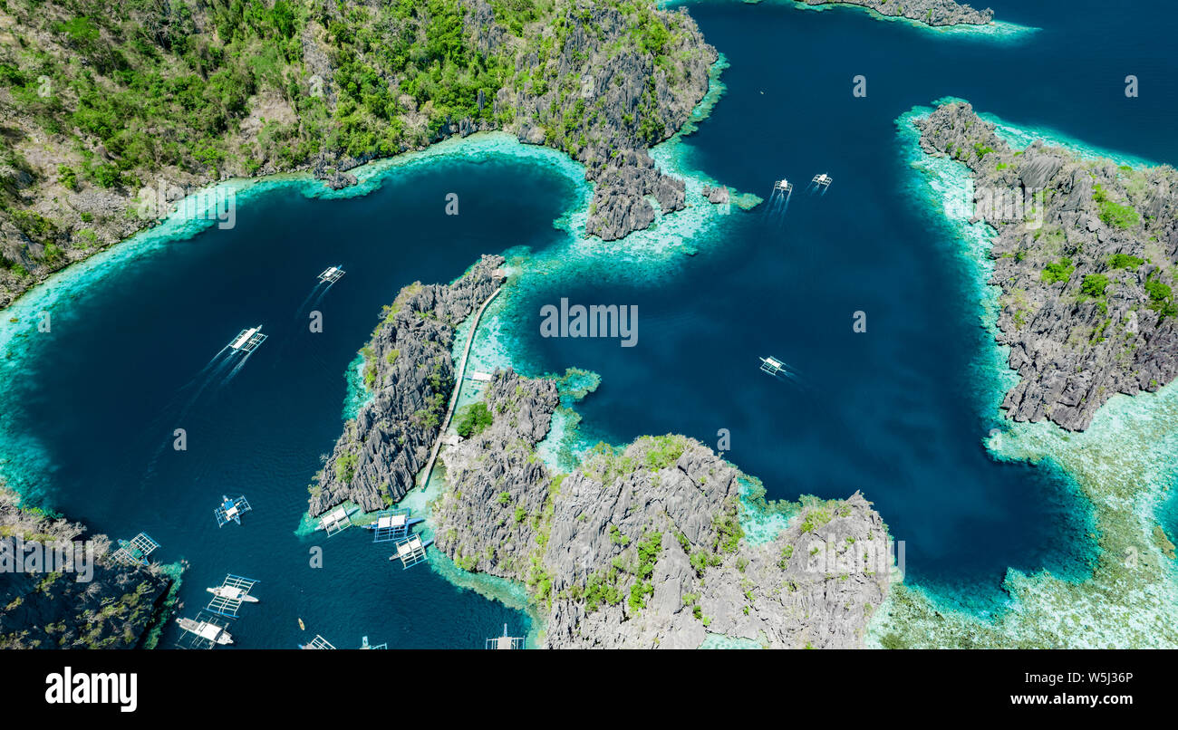 Aerial view of beautiful lagoons and limestone cliffs of Coron, Palawan ...