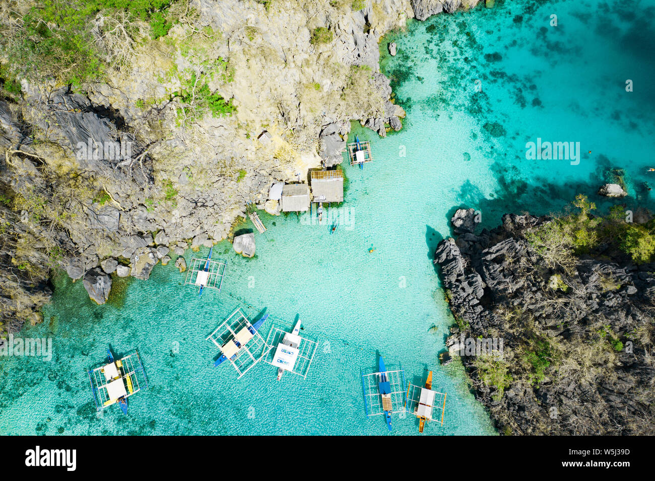 Aerial view of beautiful lagoons and limestone cliffs of Coron, Palawan ...