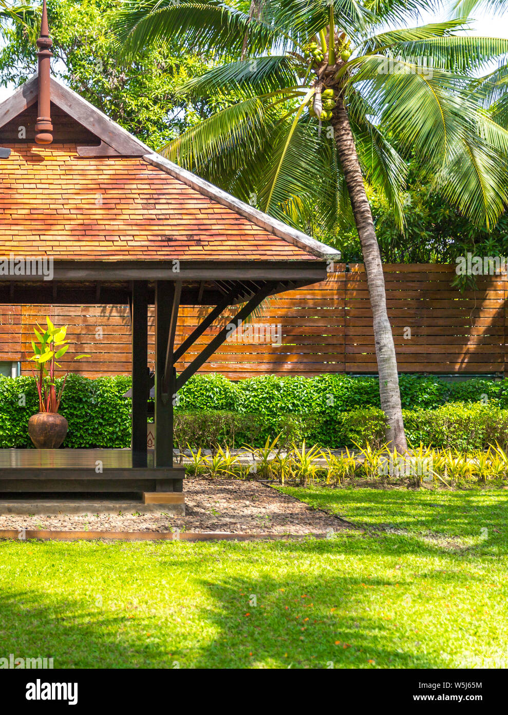 beautiful wooden gazebo in tropical nature Stock Photo - Alamy