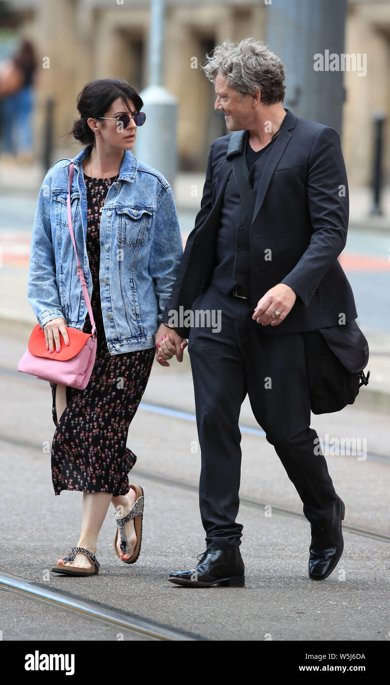 Emmerdale actor Mark Jordon and his partner Laura Norton outside ...